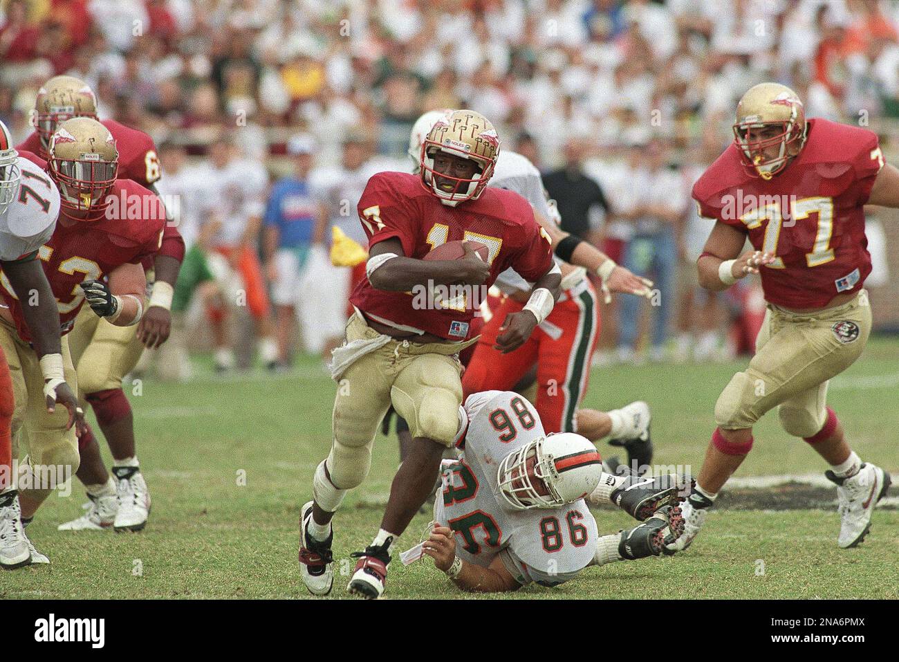 Florida State University quarterback Charlie Ward (17) is shown in ...