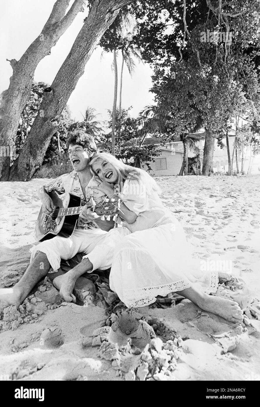 British rock musician Mick Jagger from The Rolling Stones, with his ...