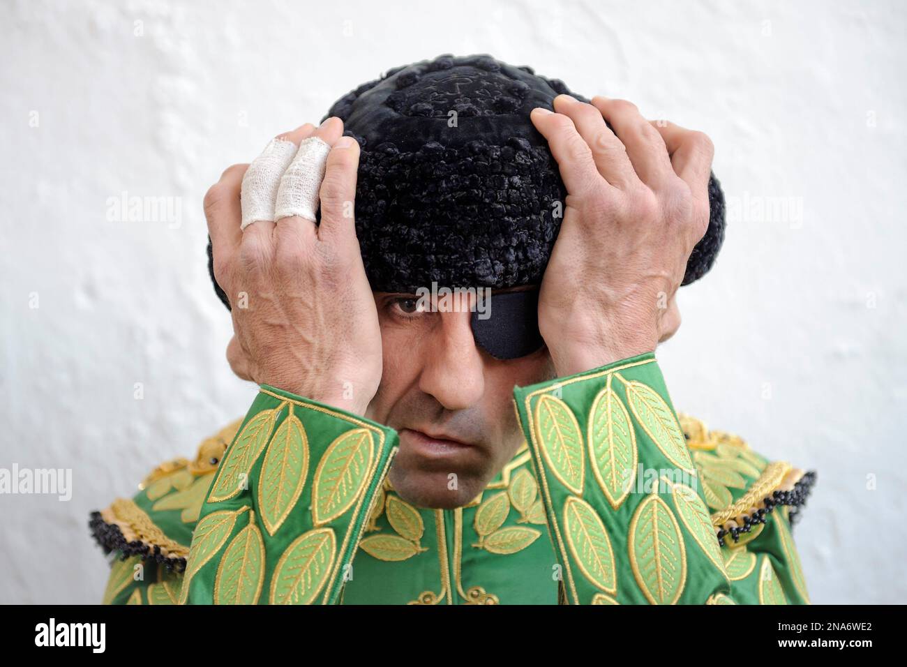 Spanish bullfighter Juan Jose Padilla adjusts his 'montera' or ...