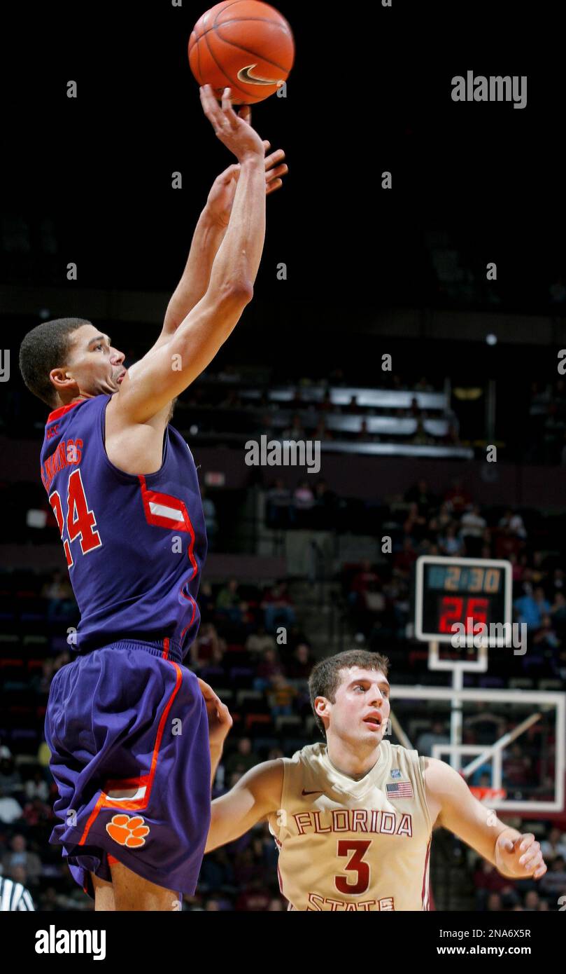 Clemson's Milton Jennings shoots in front of Florida State's Luke ...