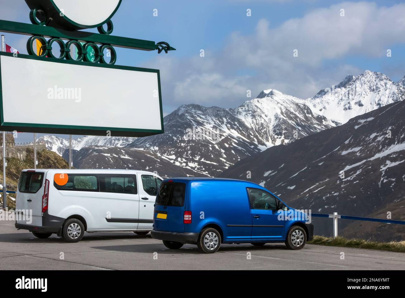 Two camper vans parked at look out point, ready to head out for a drive ...
