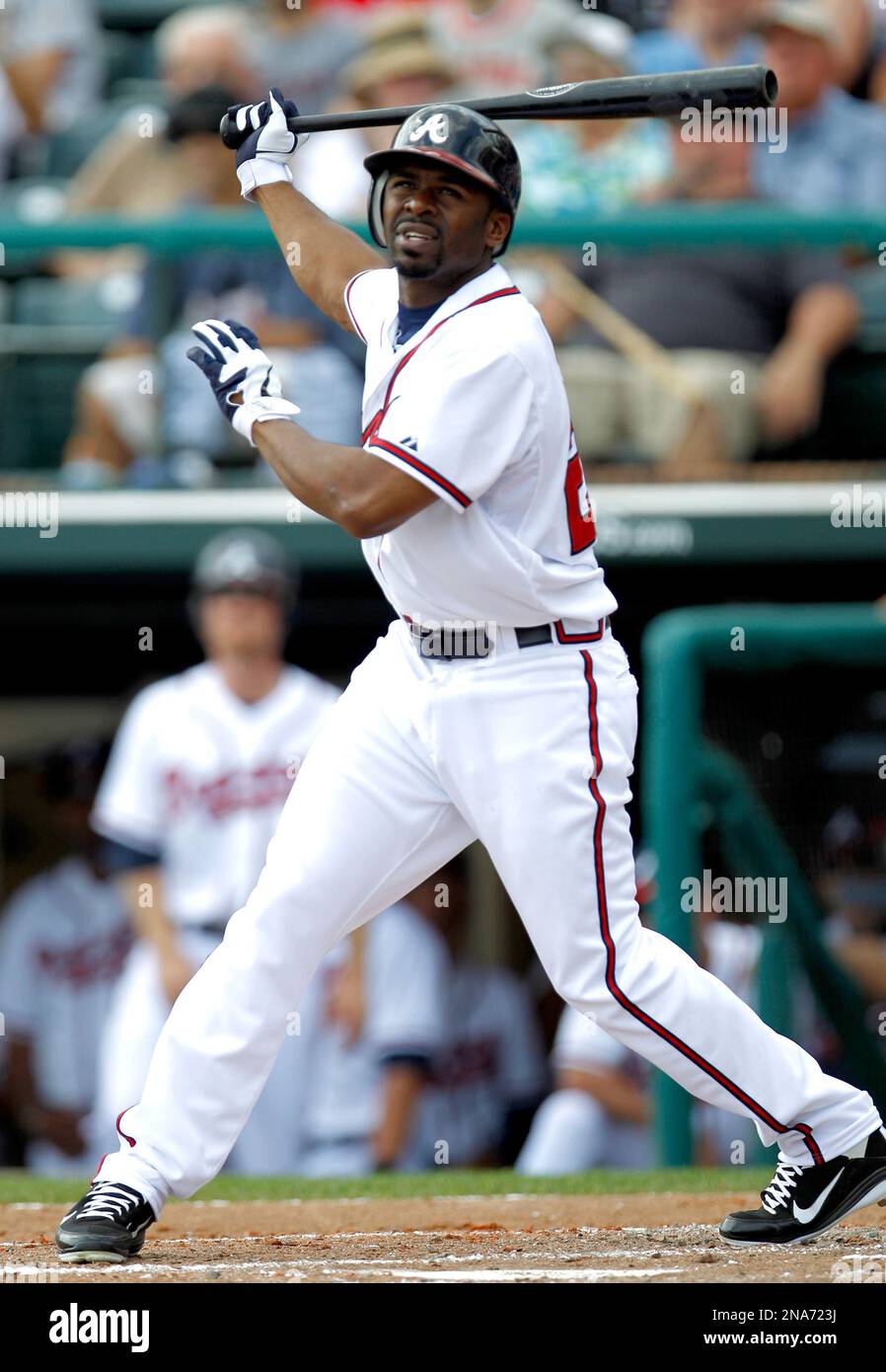 Atlanta Braves Michael Bourn swings at a pitch during a spring training ...