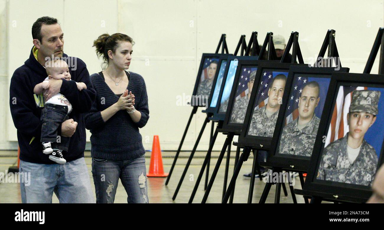 Jeff Archer, left, of Duncan, Okla., holding four-month old Cole Jones ...