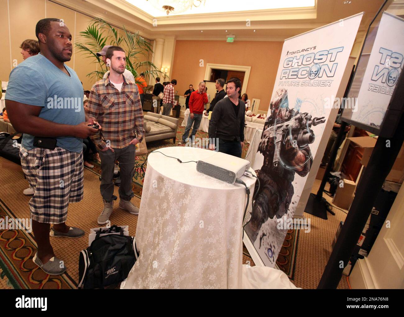 Eric Foster, left, plays Ubisoft's "Tom Clancy's Ghost Recon Future ...