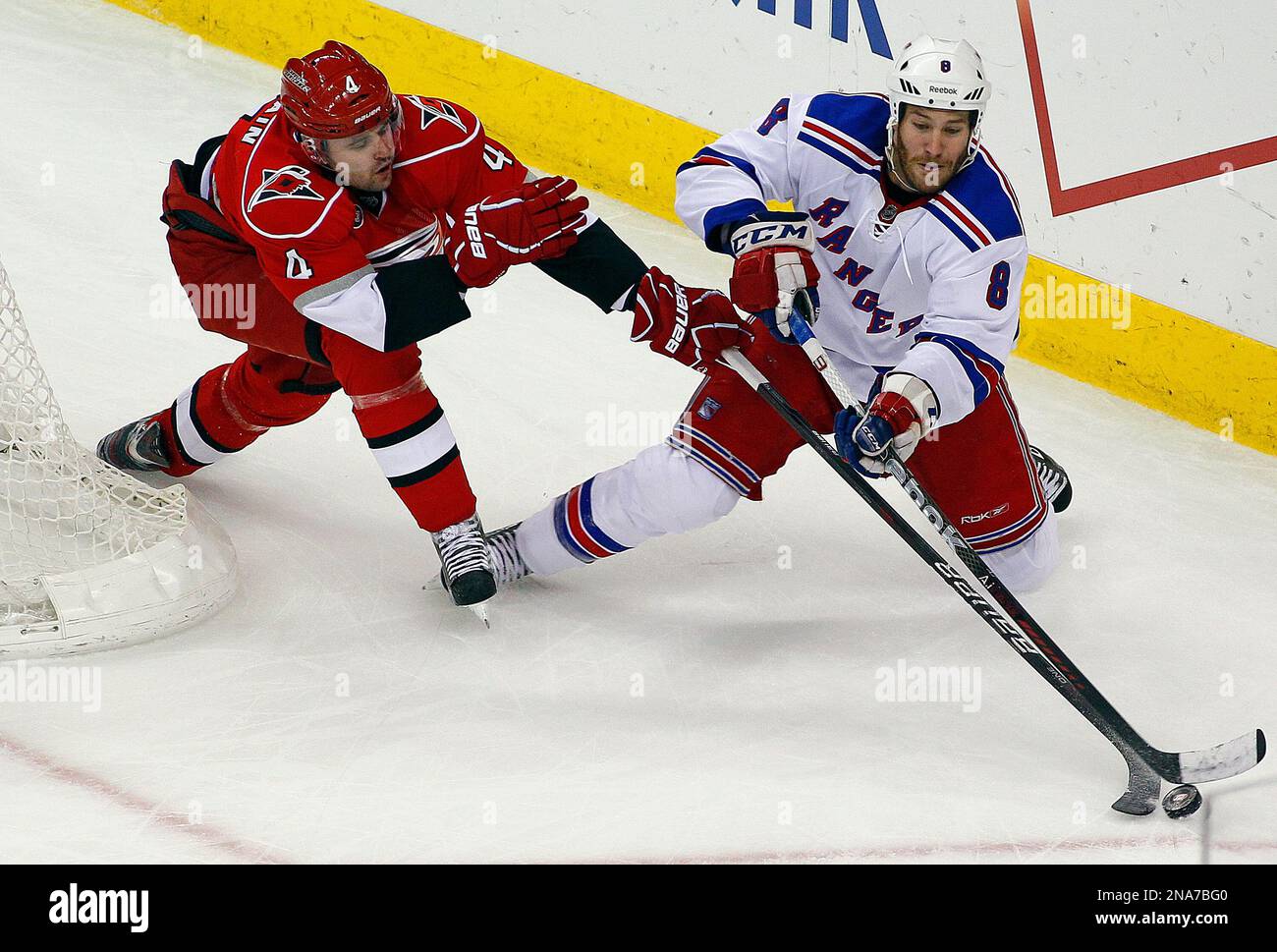 New York Rangers' Brandon Prust (8) tries to control the puck against ...