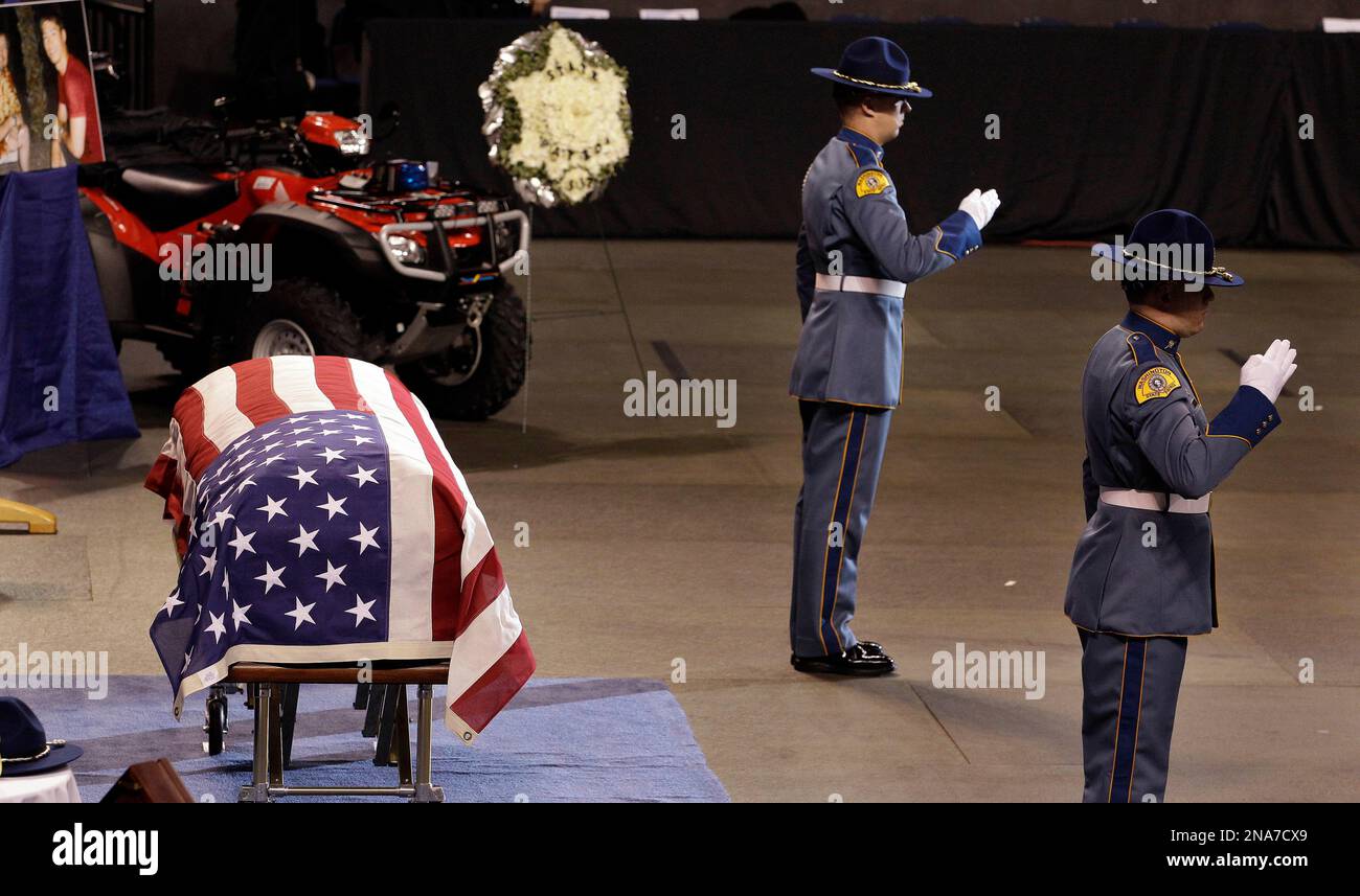 Washington State Patrol troopers salute while being relieved after ...