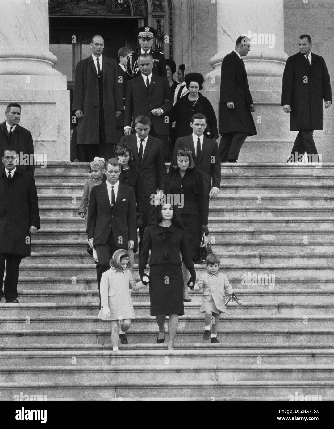 Kennedy family members descend steps in Washington, Nov. 25, 1963, at ...