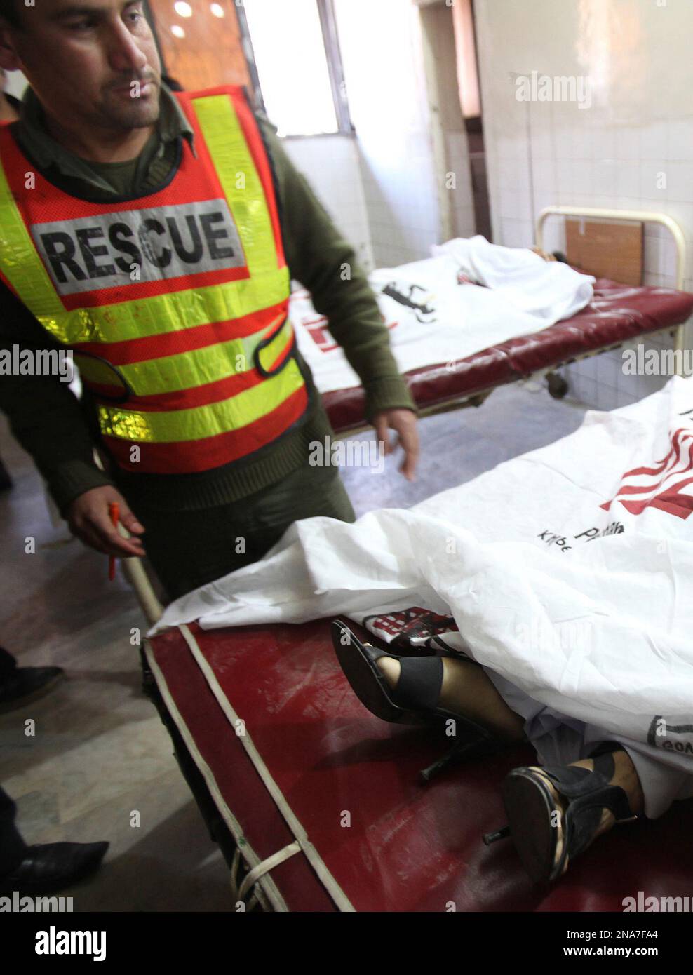 In this picture taken on Feb. 28, 2012, a Pakistani volunteer stands ...