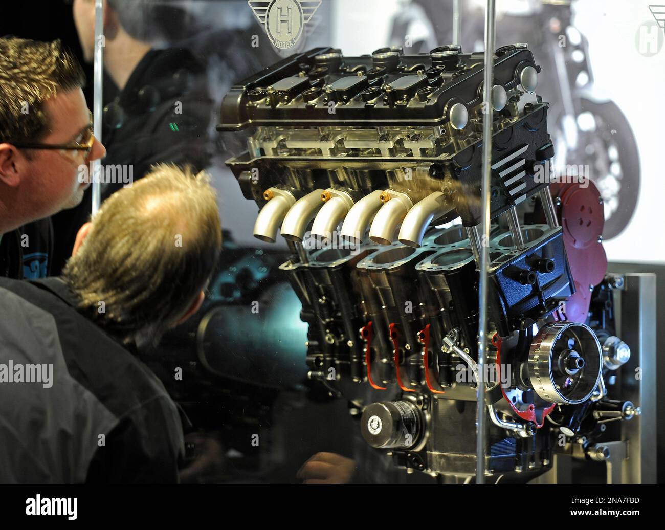 Visitors inspect a Motorcycle engine from a Horex at the "Motorraeder ...