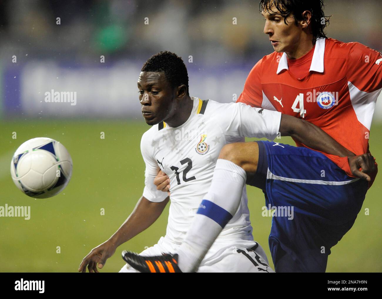 Chile's Lucas Dominguez, right, and Ghana's Abdul Naris vie for the ...