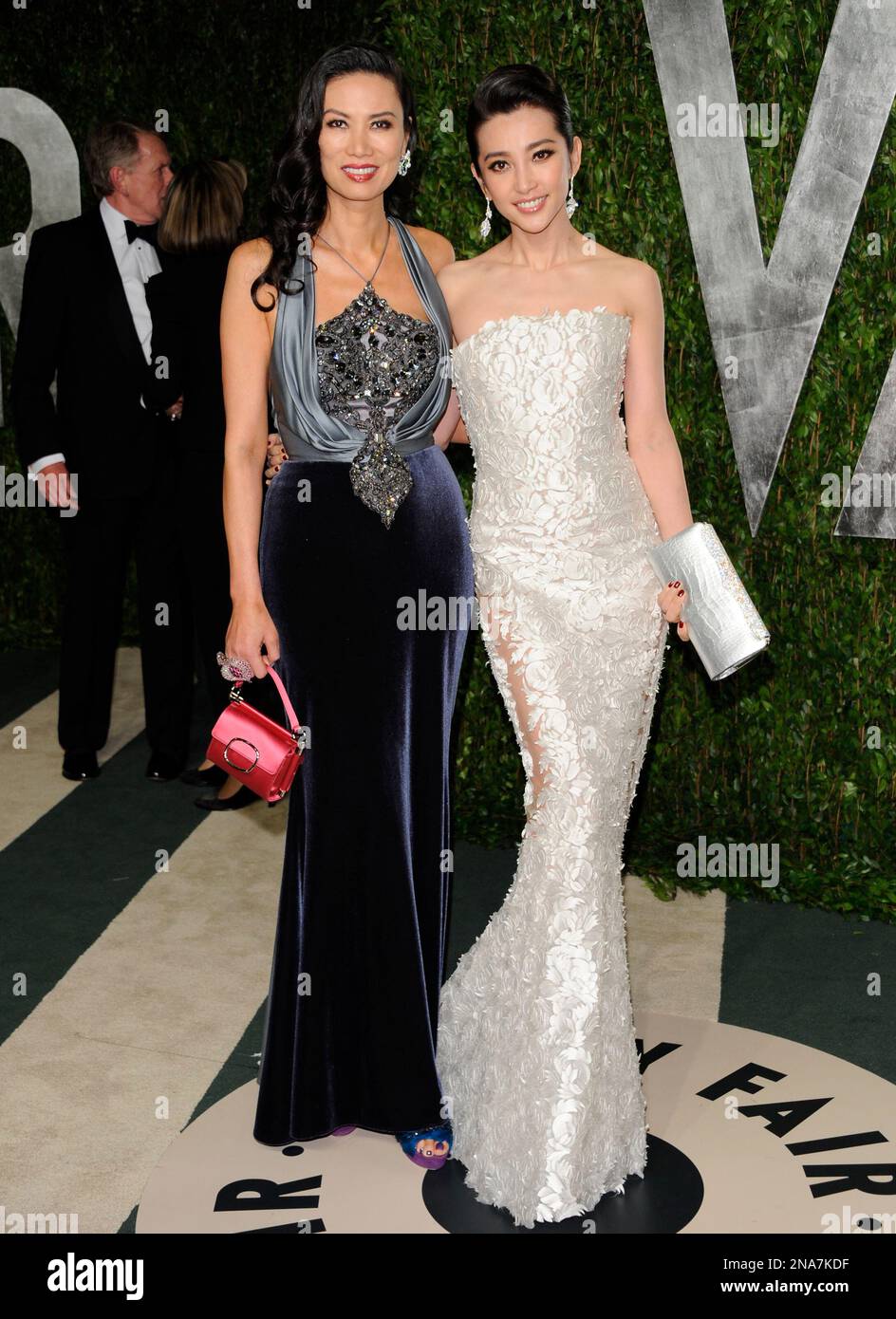 Wendi Deng Murdoch, left, and Chinese actress Li Bingbing arrive at the ...