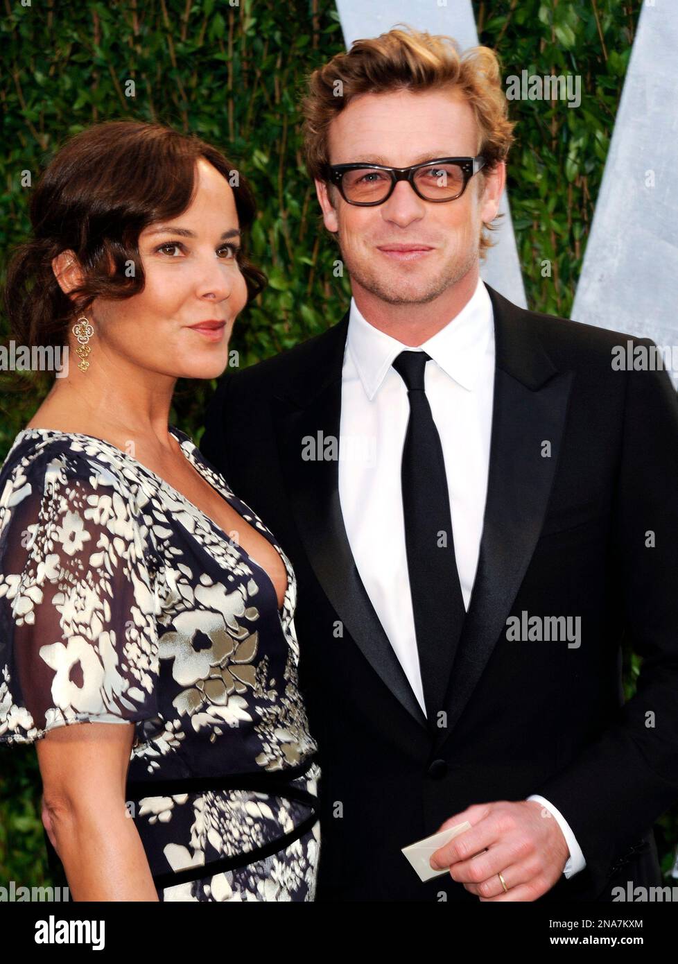 Actor Simon Baker and wife Rebecca Rigg arrive at the Vanity Fair Oscar ...