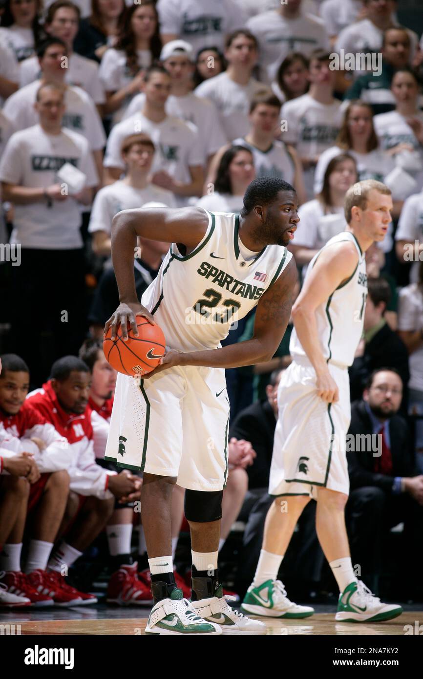 Michigan State's Draymond Green (23) and Austin Thornton are shown ...