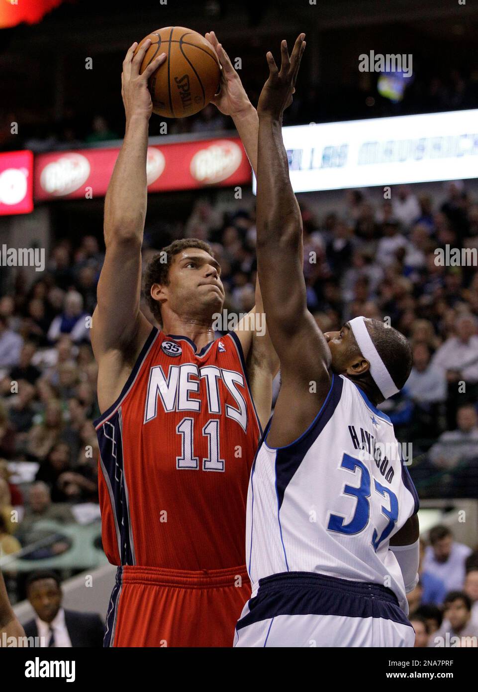 New Jersey Nets' Brook Lopez (11) and Dallas Mavericks' Brendan Haywood ...