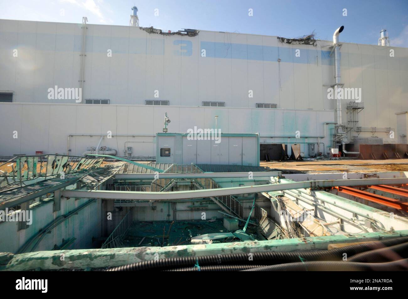 The damaged Unit 3 reactor building is seen at Tokyo Electric Power Co ...