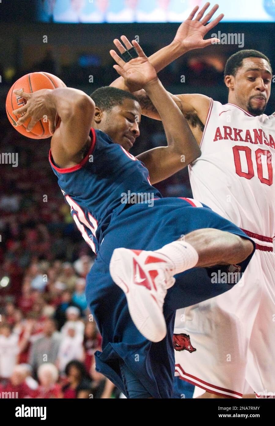 Mississippi's Jarvis Summers, left, loses control of the ball after ...