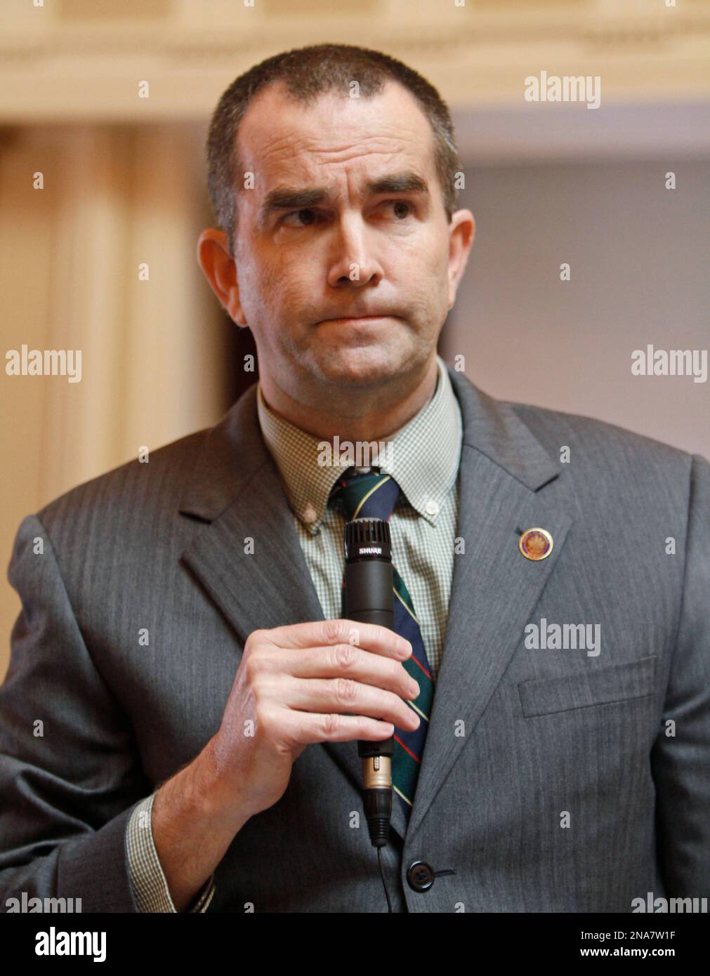 State Sen. Ralph Northam, D-Norfolk, the senate's only doctor, grimaces ...