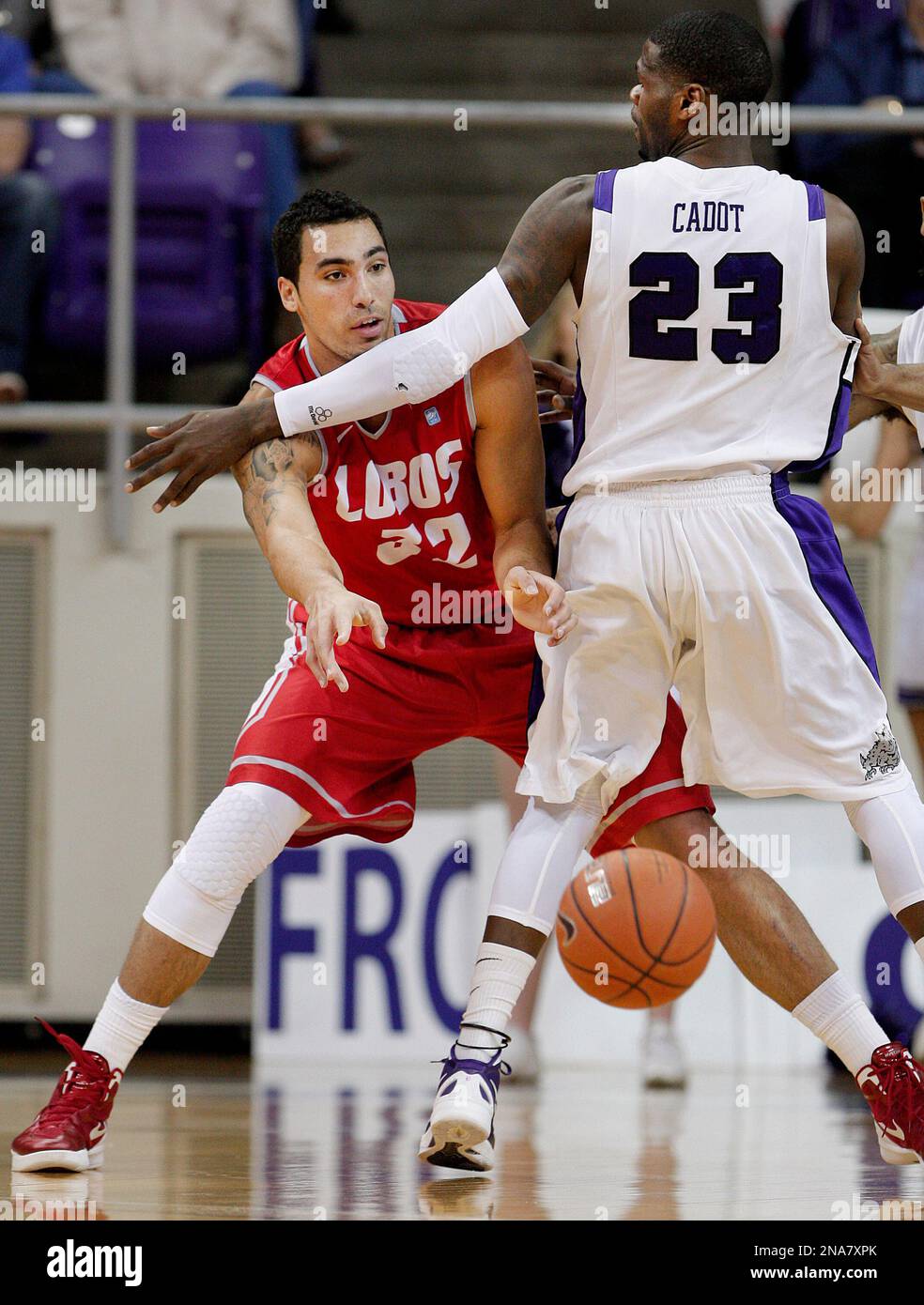 New Mexico forward Drew Gordon (32) passes the ball to a teammate as ...