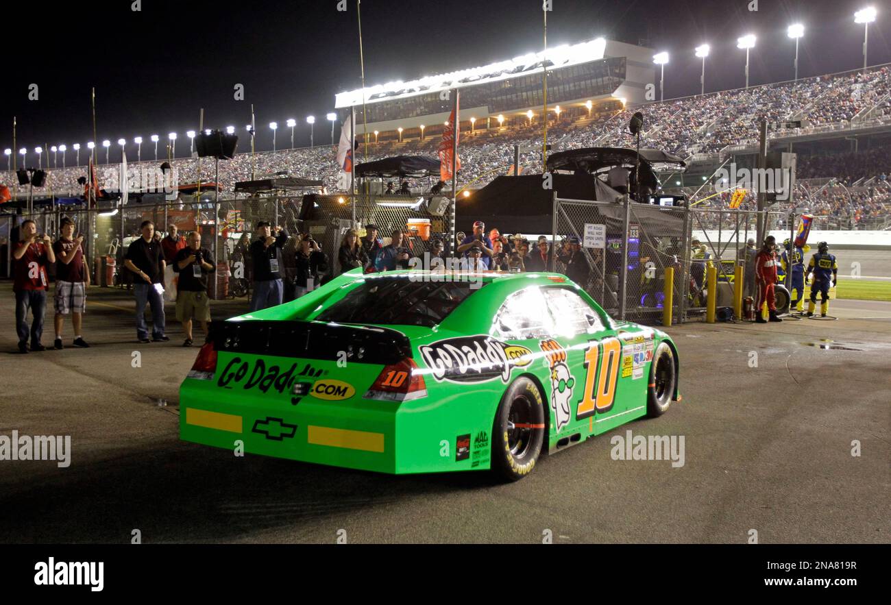 Danica Patrick takes her car back onto the track after a crash during ...