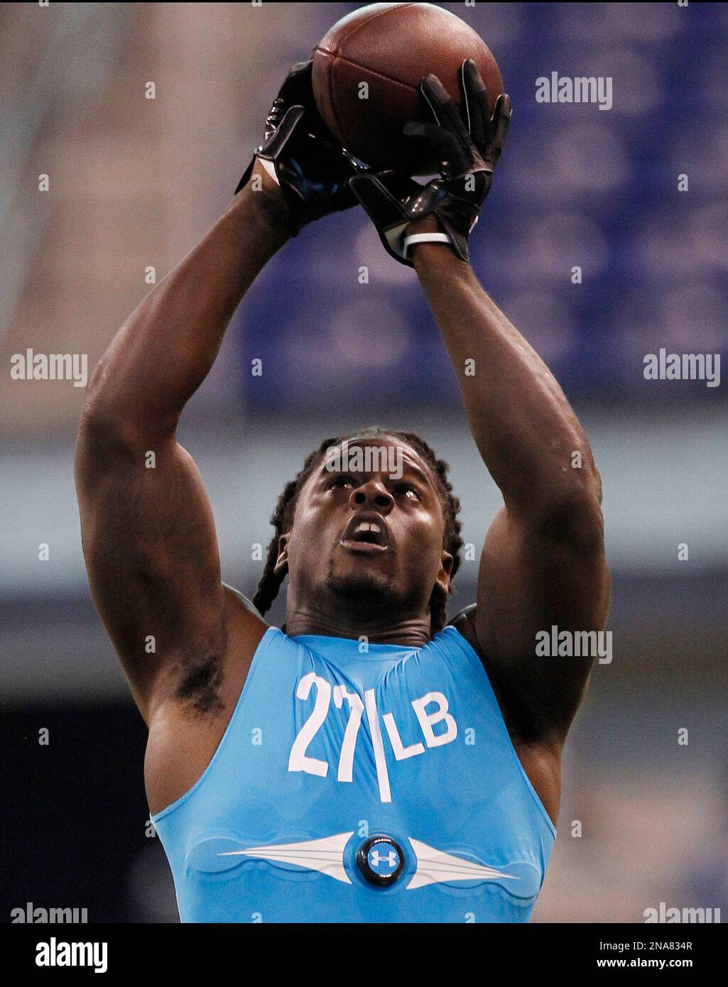 Miami linebacker Sean Spence runs a drill at the NFL football scouting ...