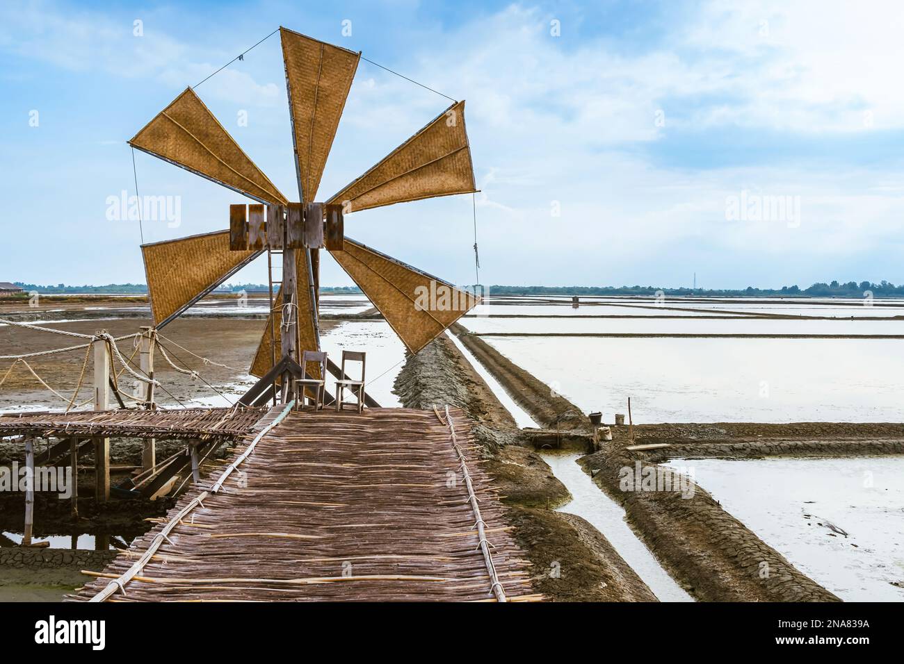 Wooden turbine at salt pan using for press seawater up to field with ...