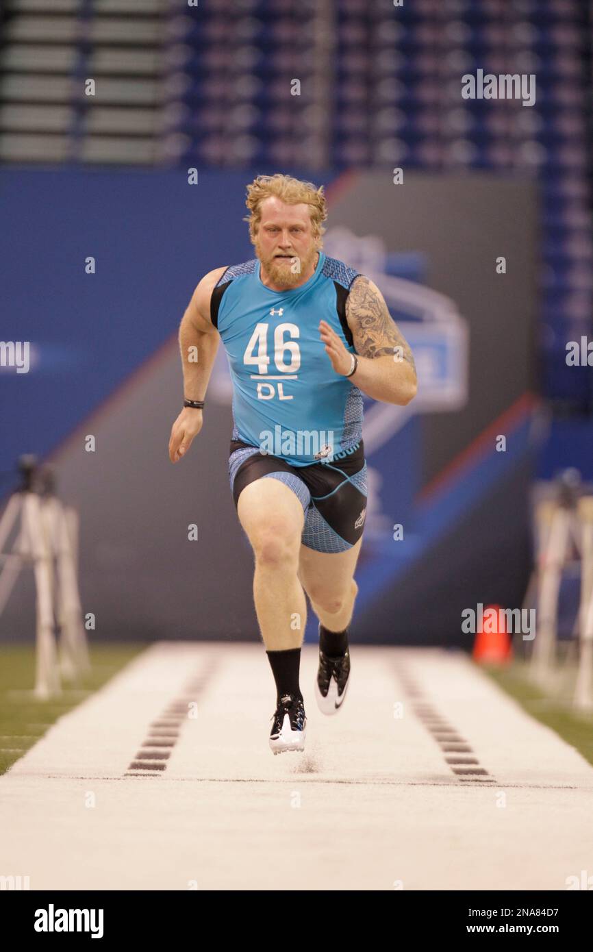Nevada defensive lineman Brett Roy runs the 40-yard dash at the NFL ...