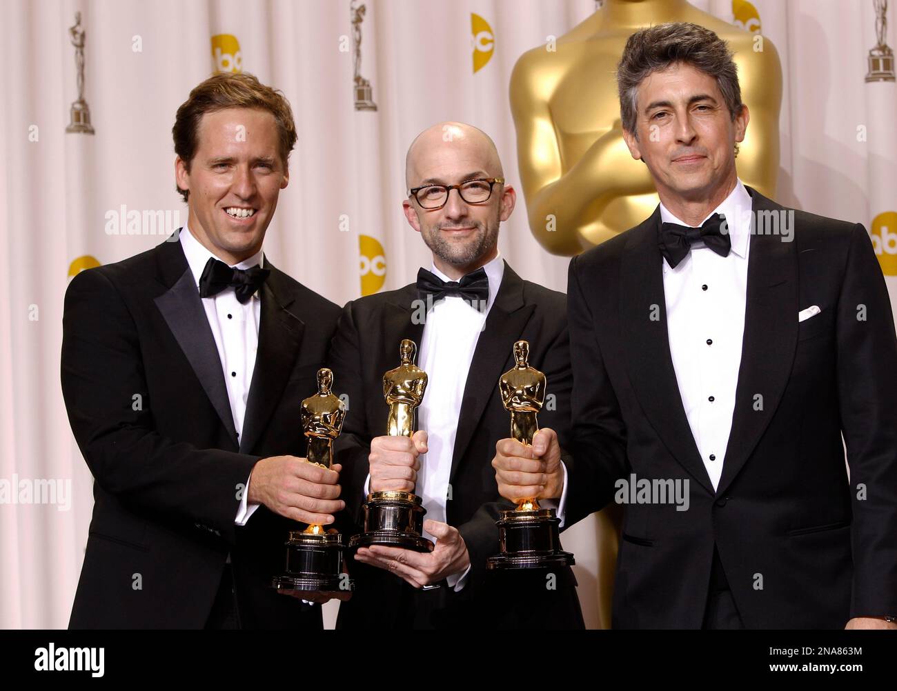 Nat Faxon, left, Jim Rash, center, and Alexander Payne pose with their ...