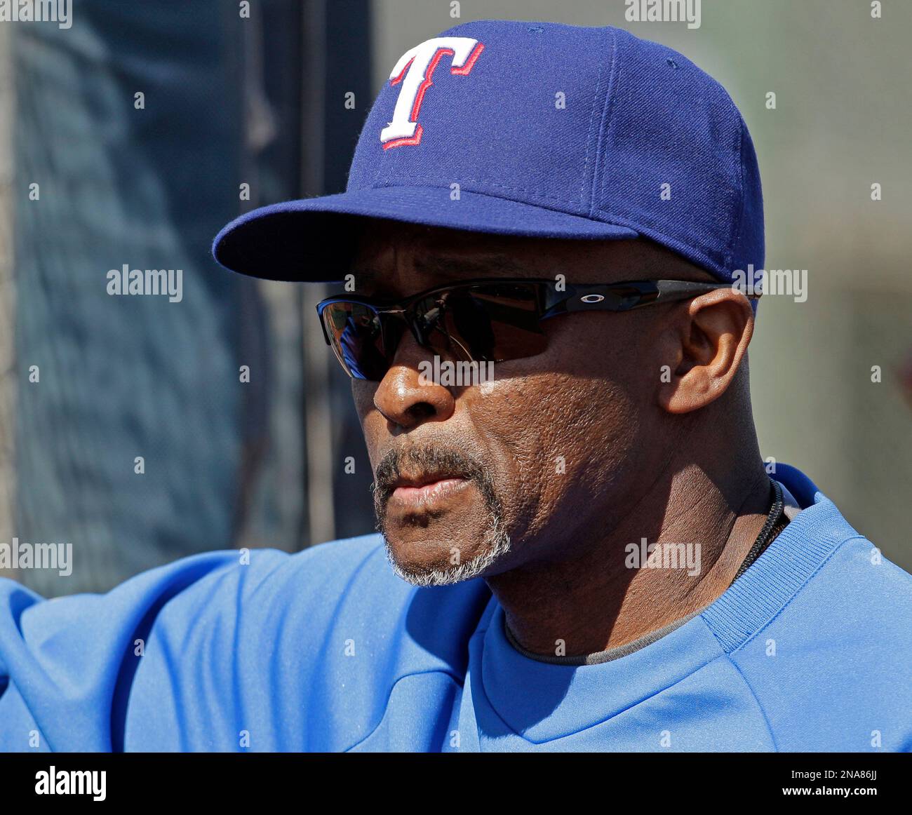 Texas Rangers first base coach Gary Pettis watches batting practice ...
