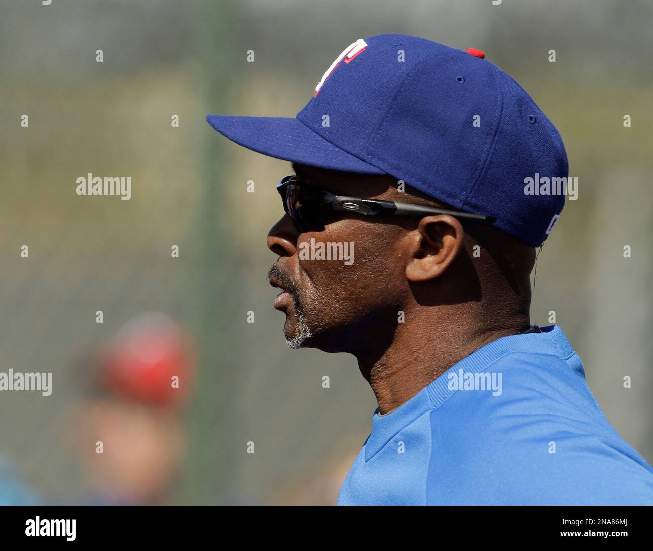 Texas Rangers first base coach Gary Pettis watches batting practice ...