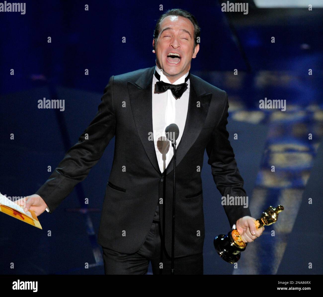 Jean Dujardin accepts the Oscar for best actor in a leading role for ...