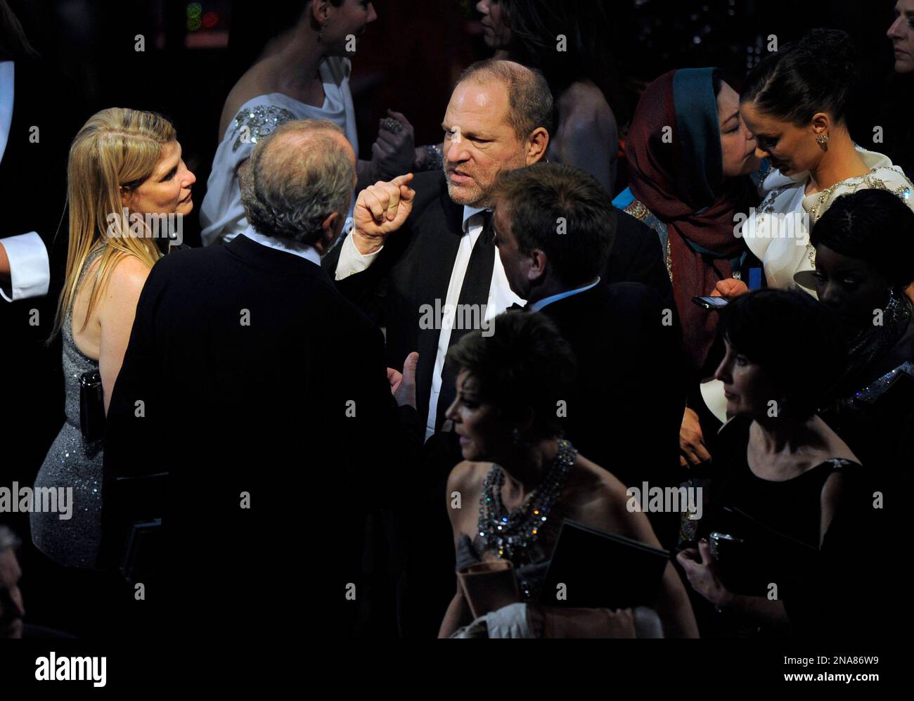 Harvey Weinstein, center, speaks in the audience during the 84th ...
