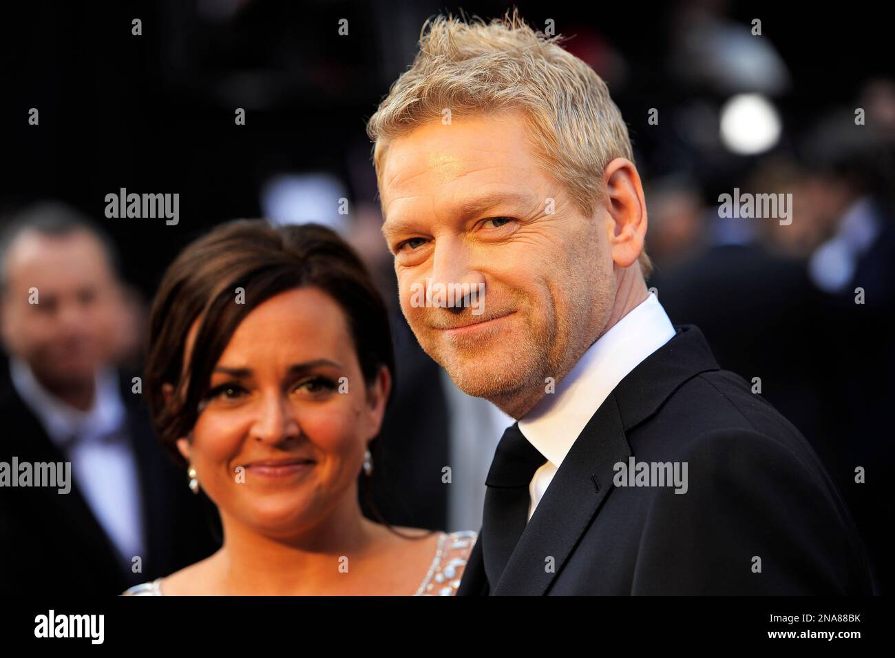 Kenneth Branagh, right, and wife Lindsay Brunnock arrives before the ...