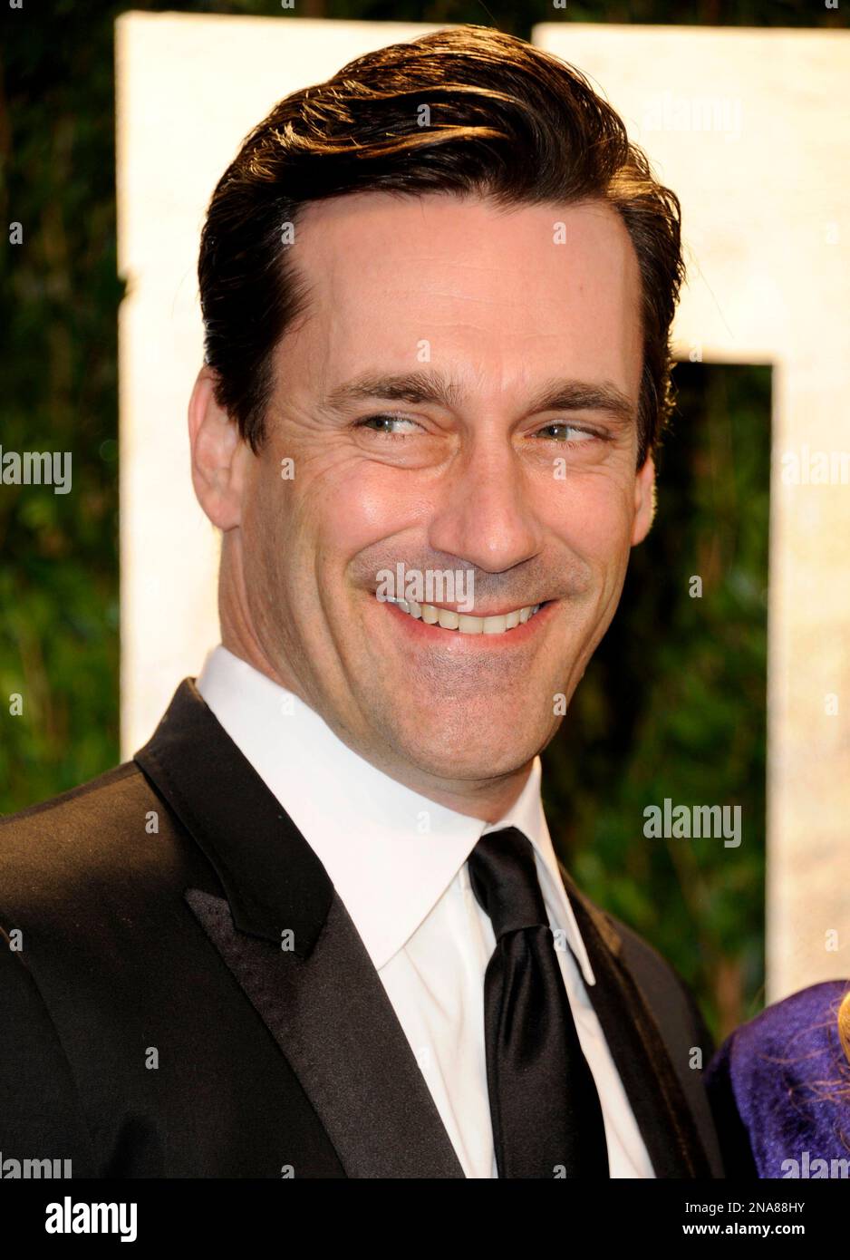 Jon Hamm arrives at the Vanity Fair Oscar party on Sunday, Feb. 26 ...