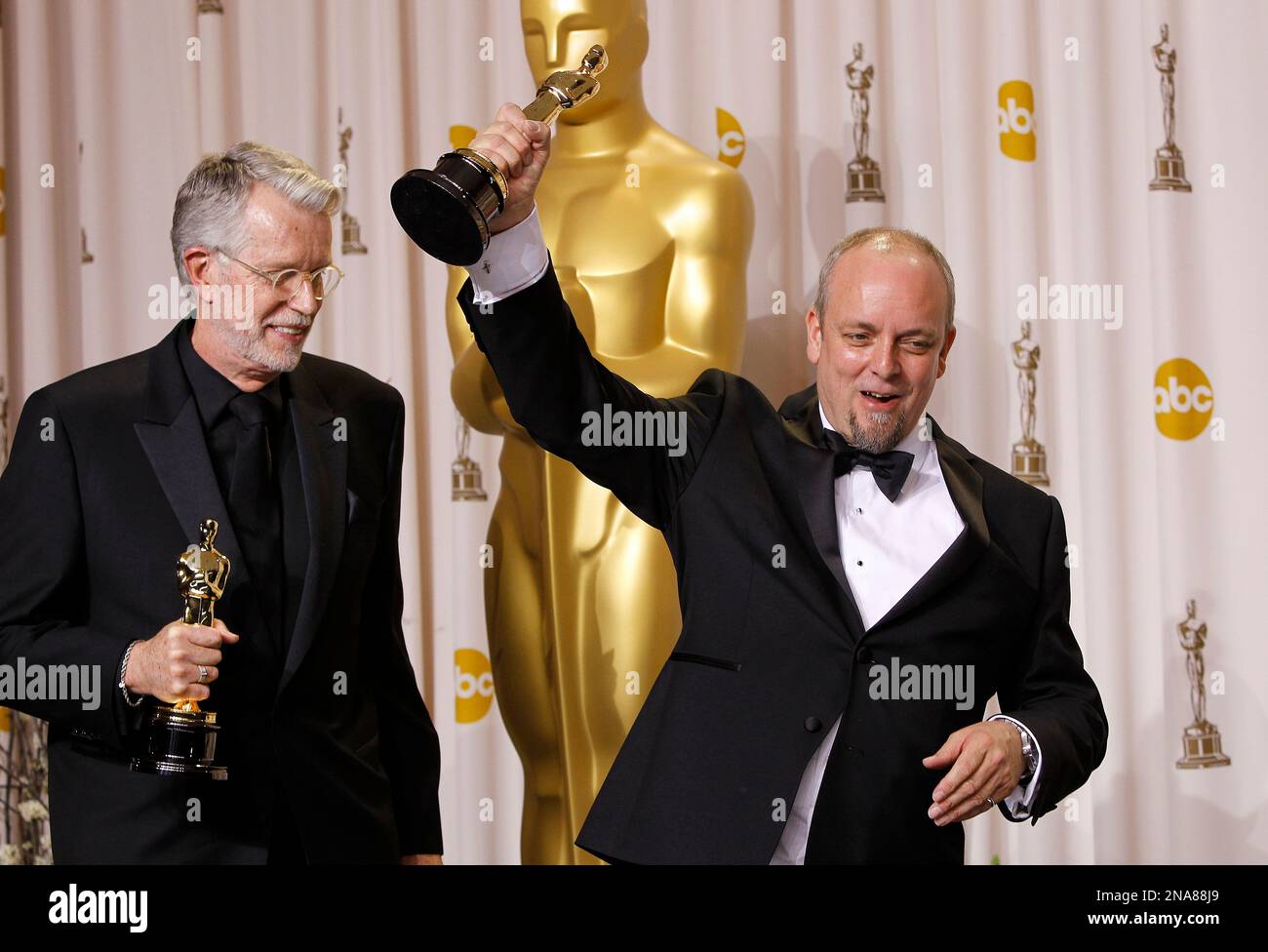 Mark Coulier, left, and J. Roy Helland pose with their award for best ...