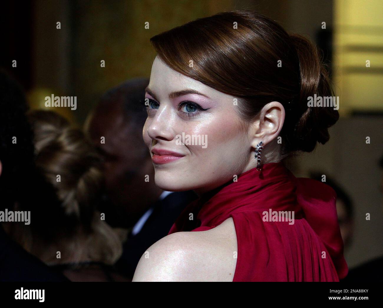 Emma Stone arrives before the 84th Academy Awards on Sunday, Feb. 26 ...