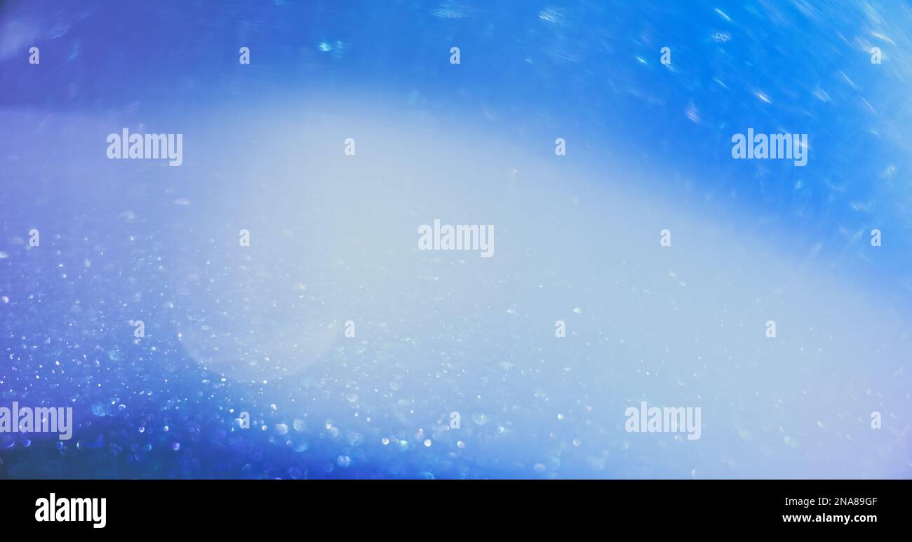 defocused glow overlay bokeh light blue lens flare Stock Photo - Alamy