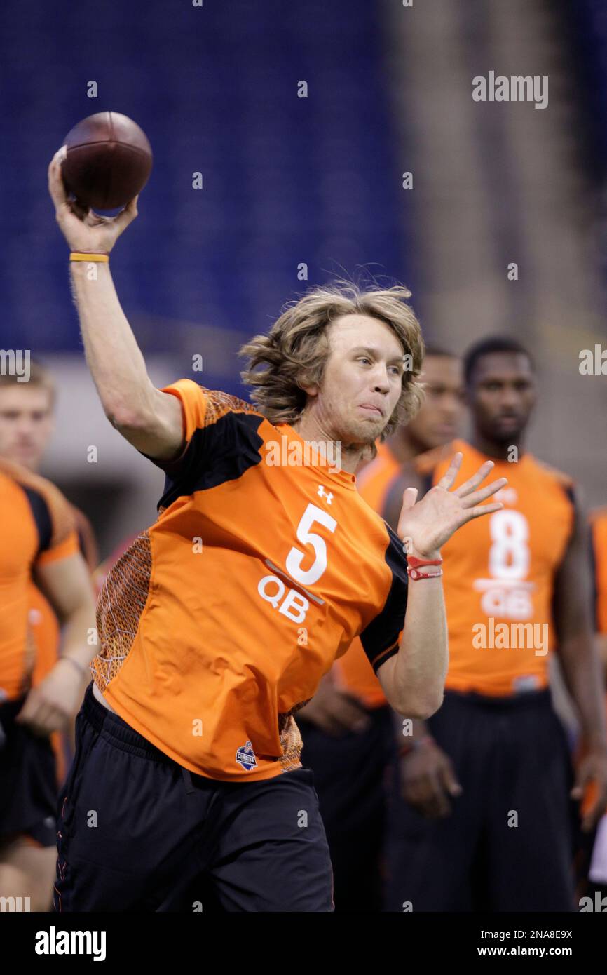 Arizona quarterback Nick Foles throws a pass as he runs a drill at the ...