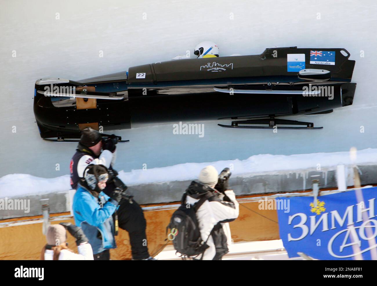 Australia's pilot Heath Spence, with pushers Gareth Nichols, Ben Lisson ...