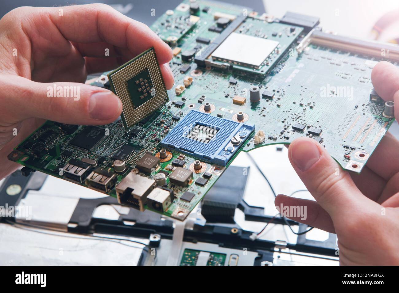 Installation of processor in CPU socket Stock Photo - Alamy