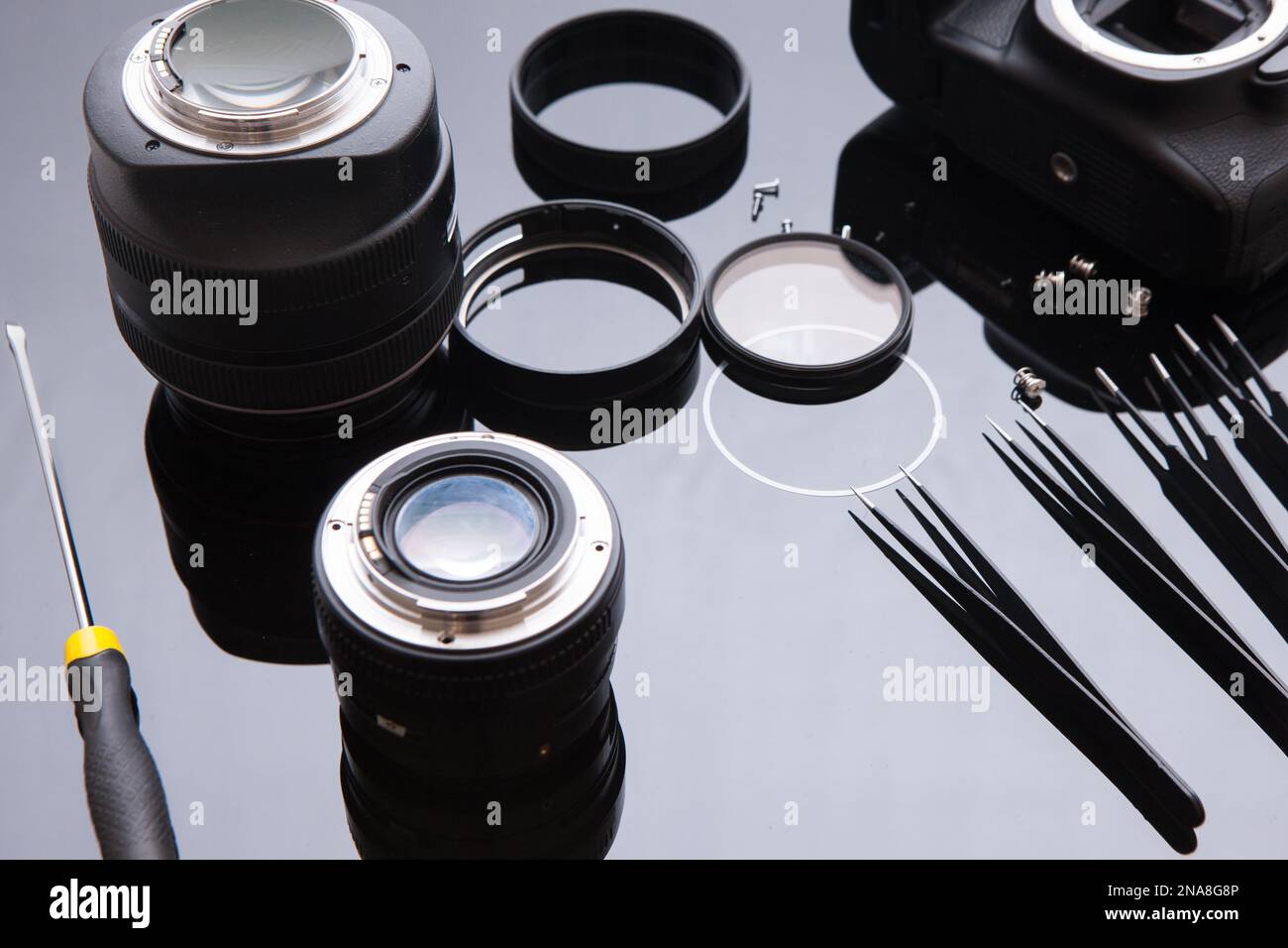 Precision optic photo lens service, adjust, align Stock Photo - Alamy
