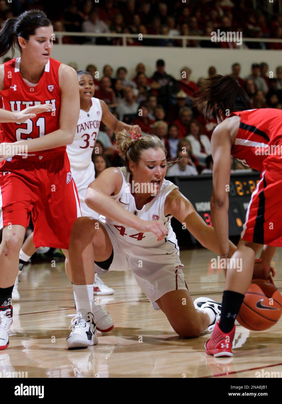 Stanford forward Joslyn Tinkle (44) loses the ball in front of Utah ...