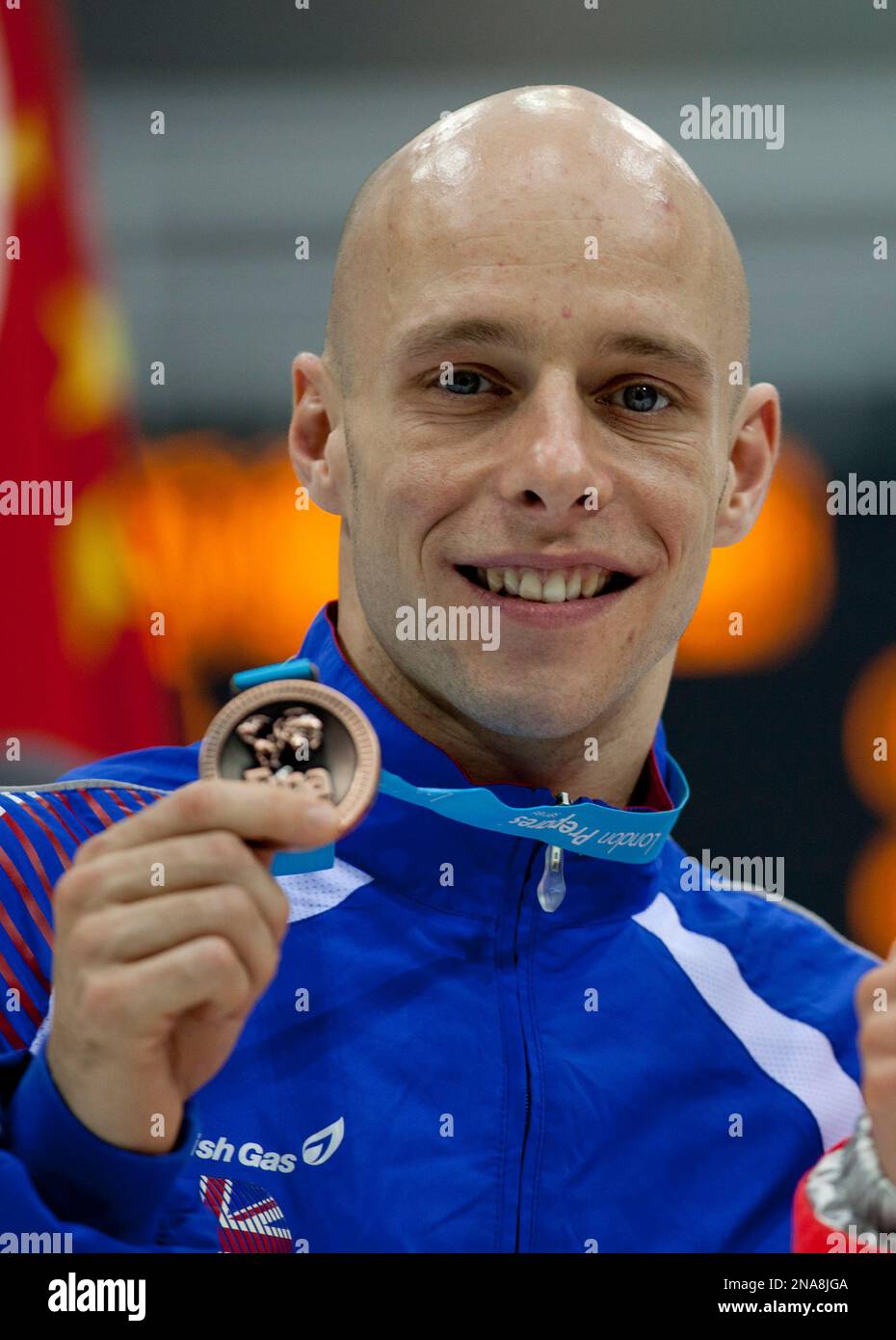 Britain's Peter Waterfield poses for photographs with his bronze medal ...