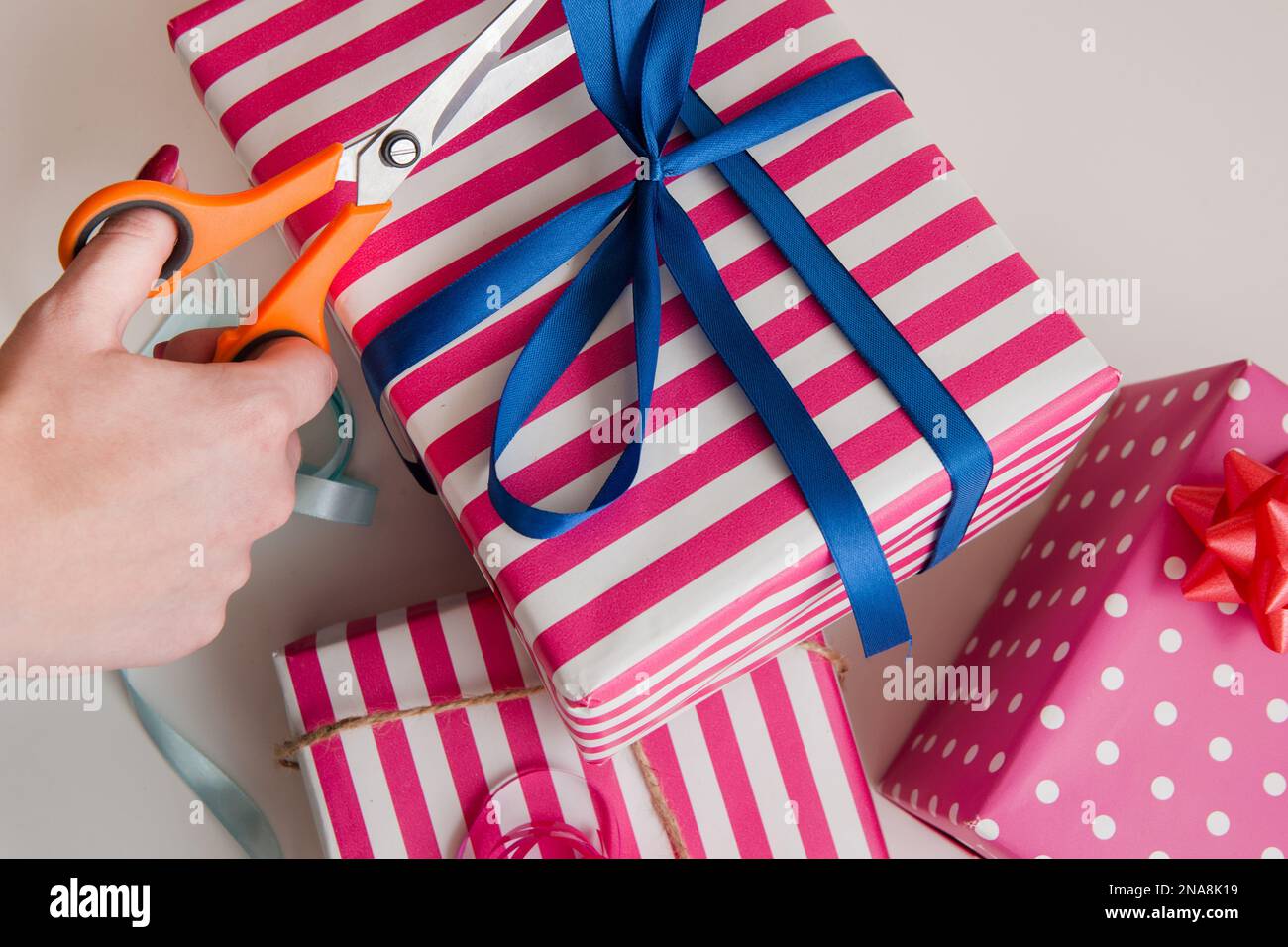 Pink gift wrapping. Birthday background Stock Photo - Alamy