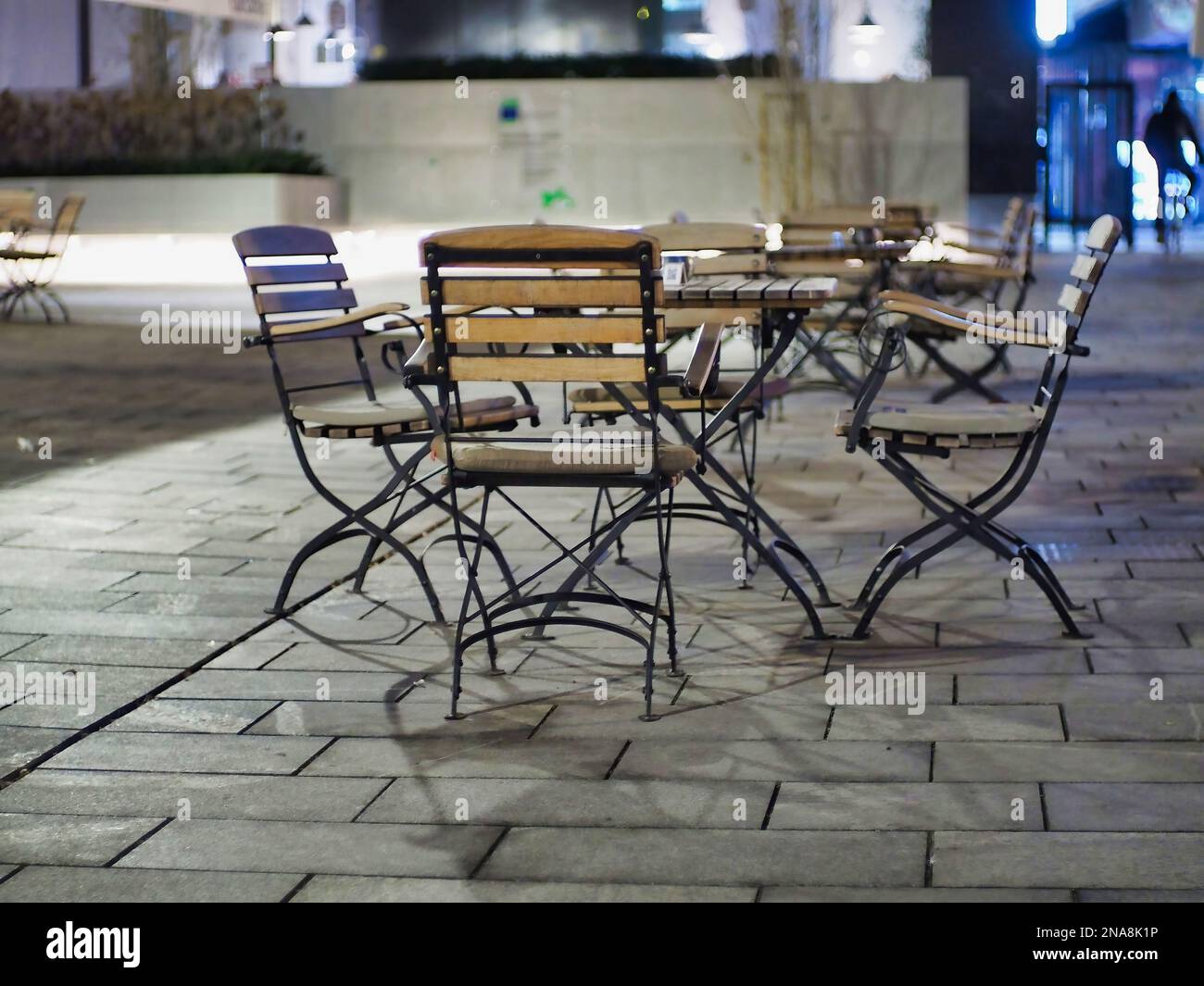Small wooden chairs with shadow on a ground, outdoor cafe Stock Photo ...
