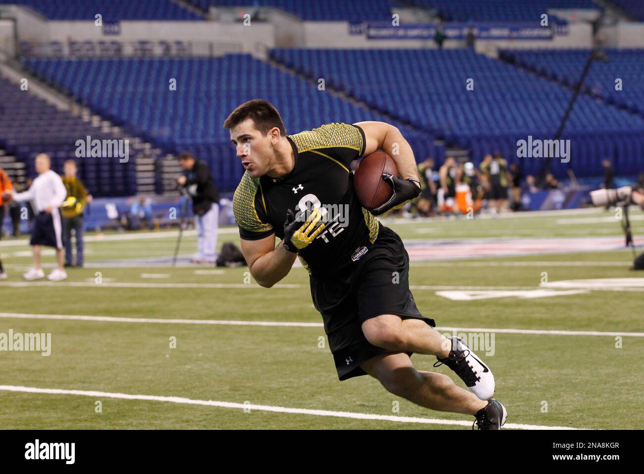 Northwestern tight end Drake Dunsmore runs a drill at the NFL football ...