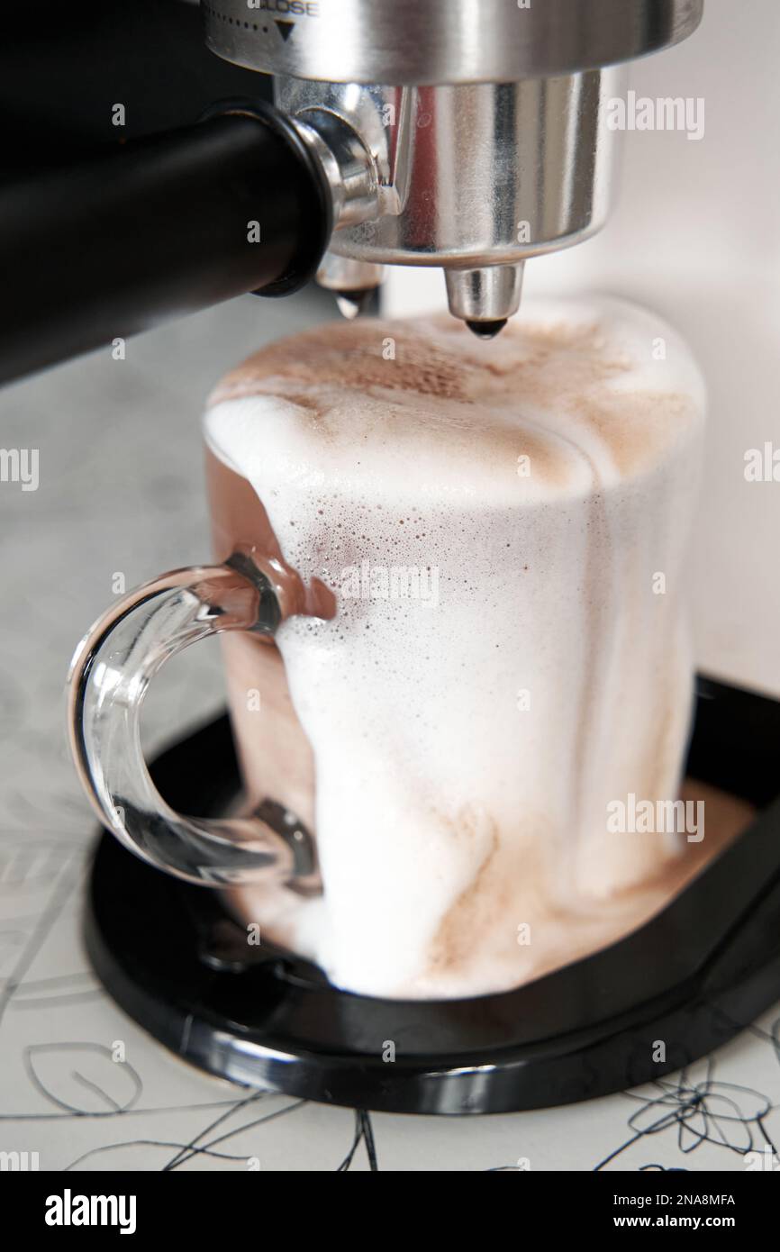 Coffee cup foam overflowing hi-res stock photography and images - Alamy