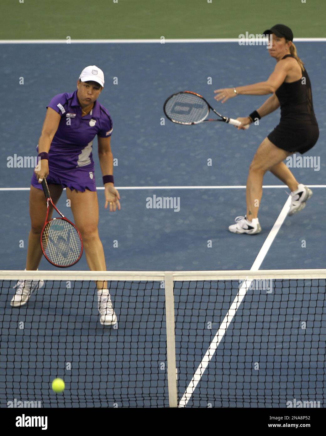 Liezel Huber, of South Africa left, and Lisa Raymond of the United ...