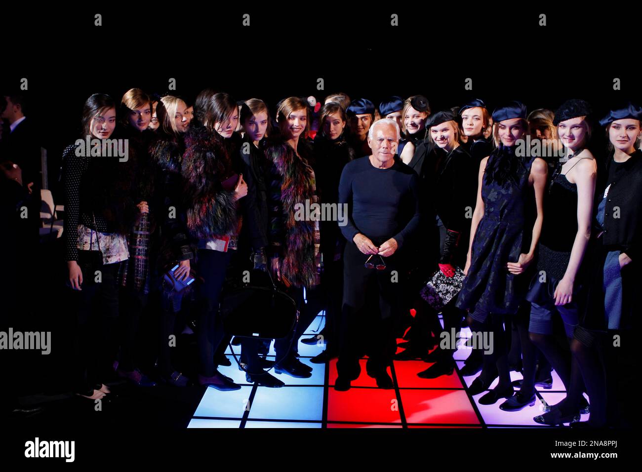 Italian fashion designer Giorgio Armani poses with models at the end of ...