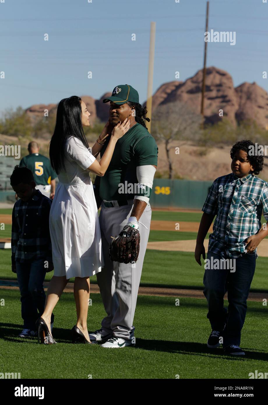 Oakland Athletics' Manny Ramirez with his wife, Juliana, following a ...