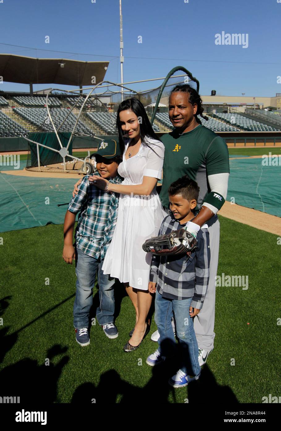 Oakland Athletics' Manny Ramirez with his wife, Juliana, and children ...